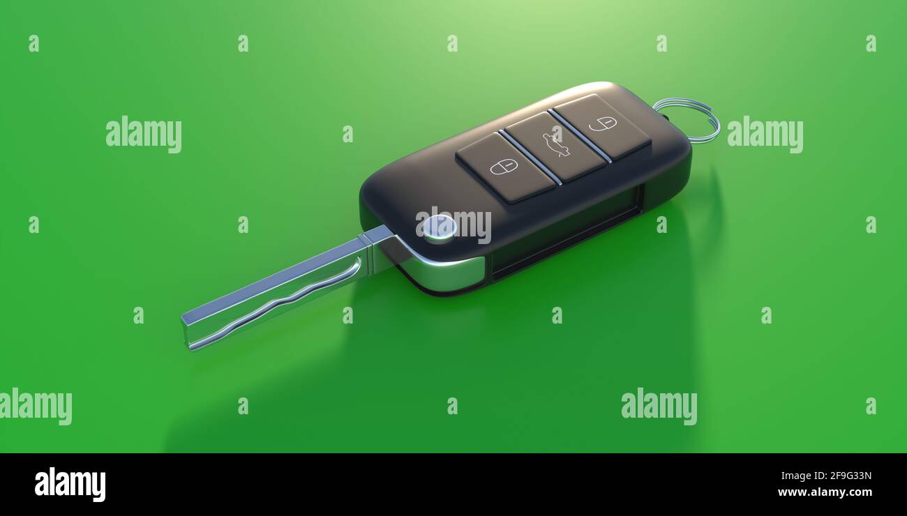Car key. Auto remote control, flip key isolated on green color ...