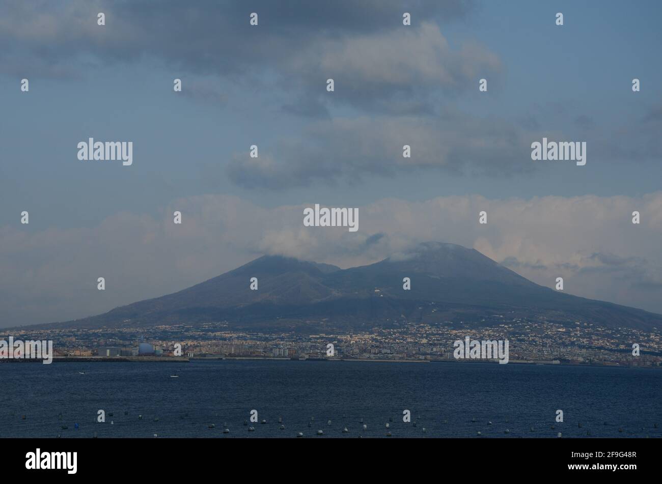 A stunning view of the Gulf of Naples and Mount Vesuvius during sunrise ...
