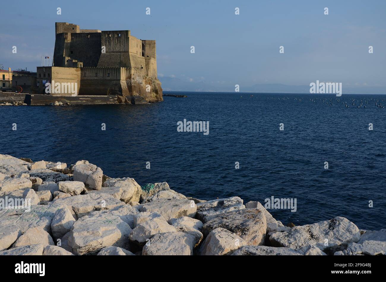 The famous Egg Castle and a stone embarked of the Gulf of Naples in ...