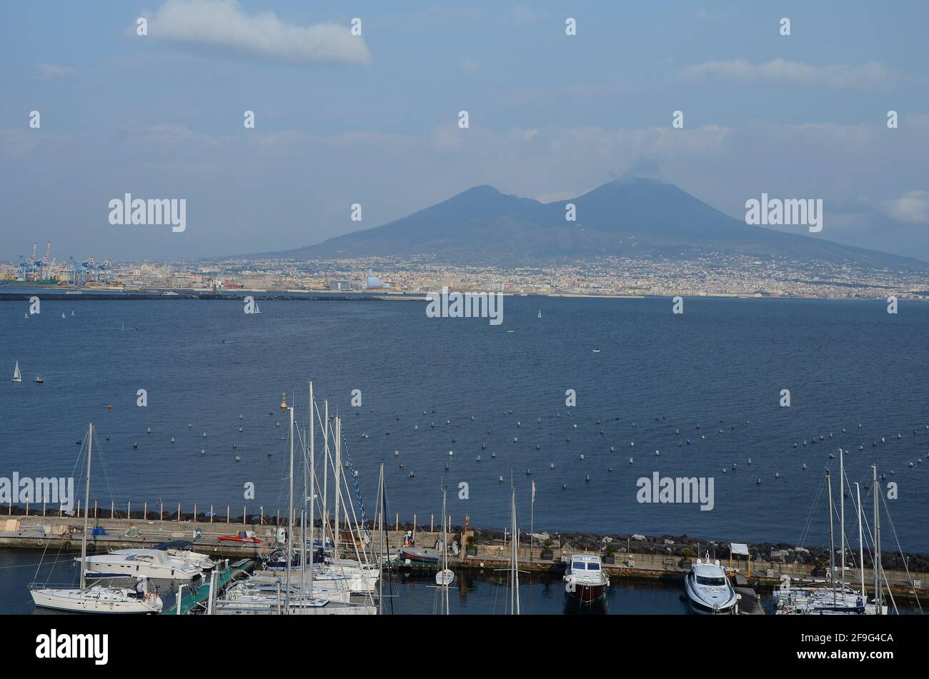 A stunning view of the Gulf of Naples and Mount Vesuvius lost in clouds ...