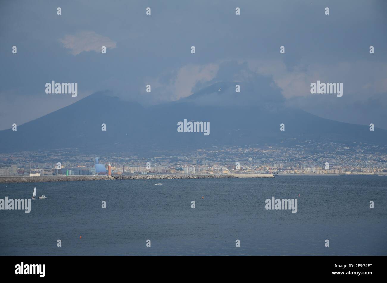 A stunning view of the Gulf of Naples and Mount Vesuvius during sunrise ...