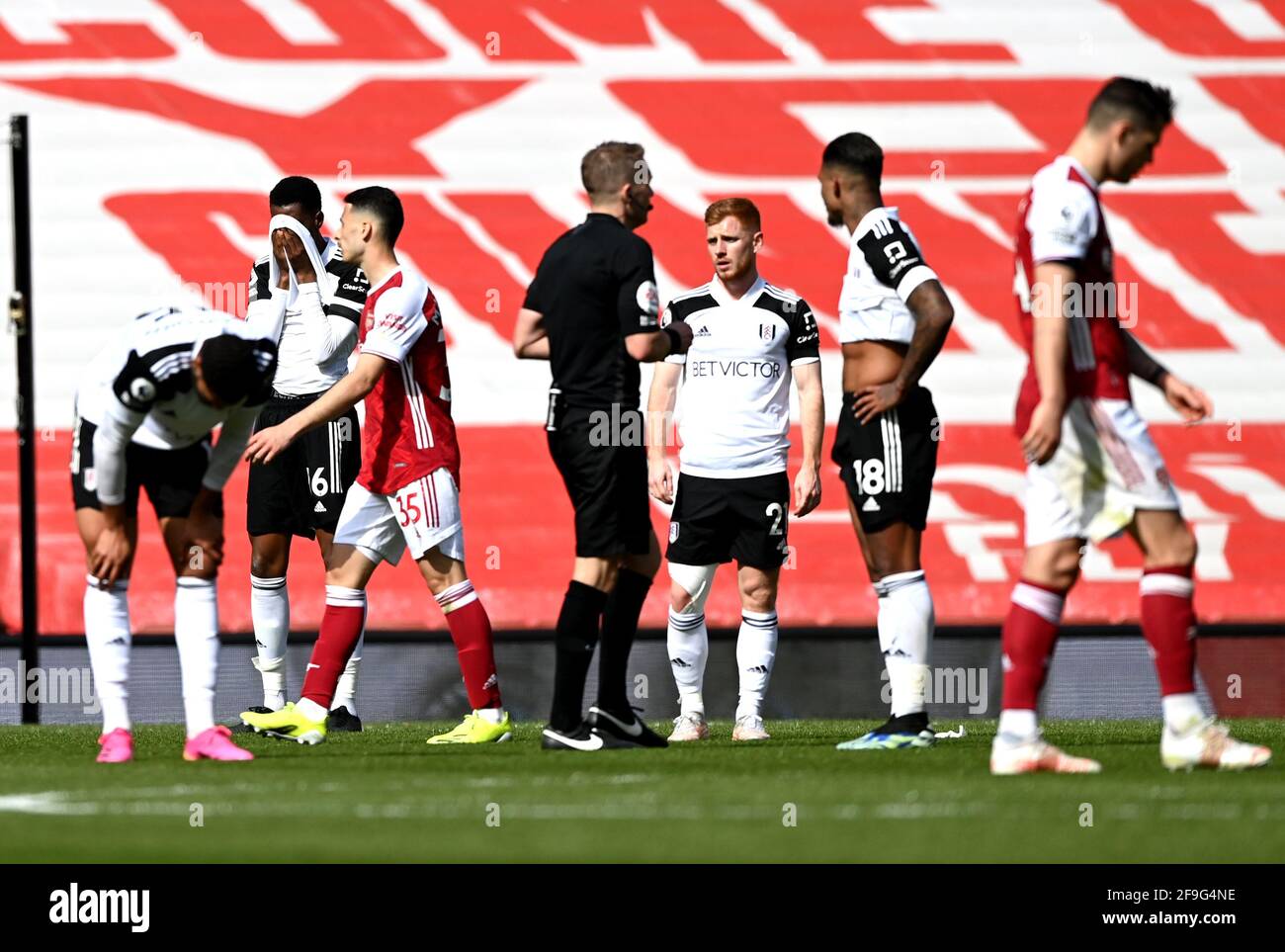 Fulham players appear dejected at the end of the Premier League match ...