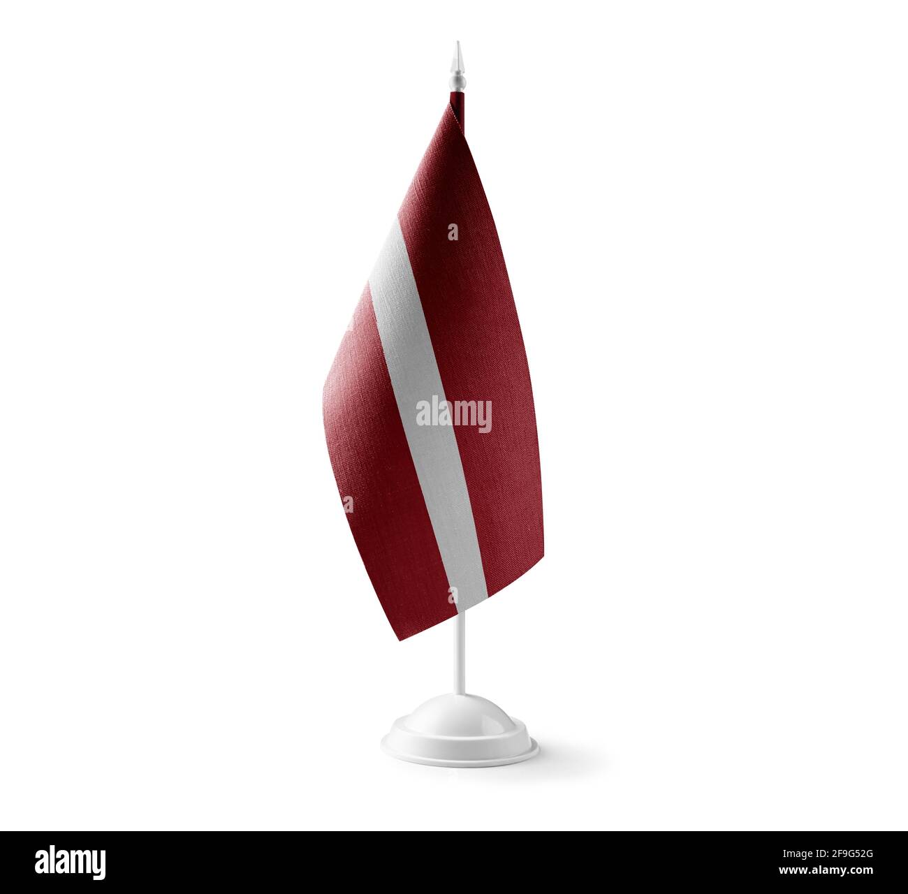 Small national flag of the Latvia on a white background Stock Photo - Alamy