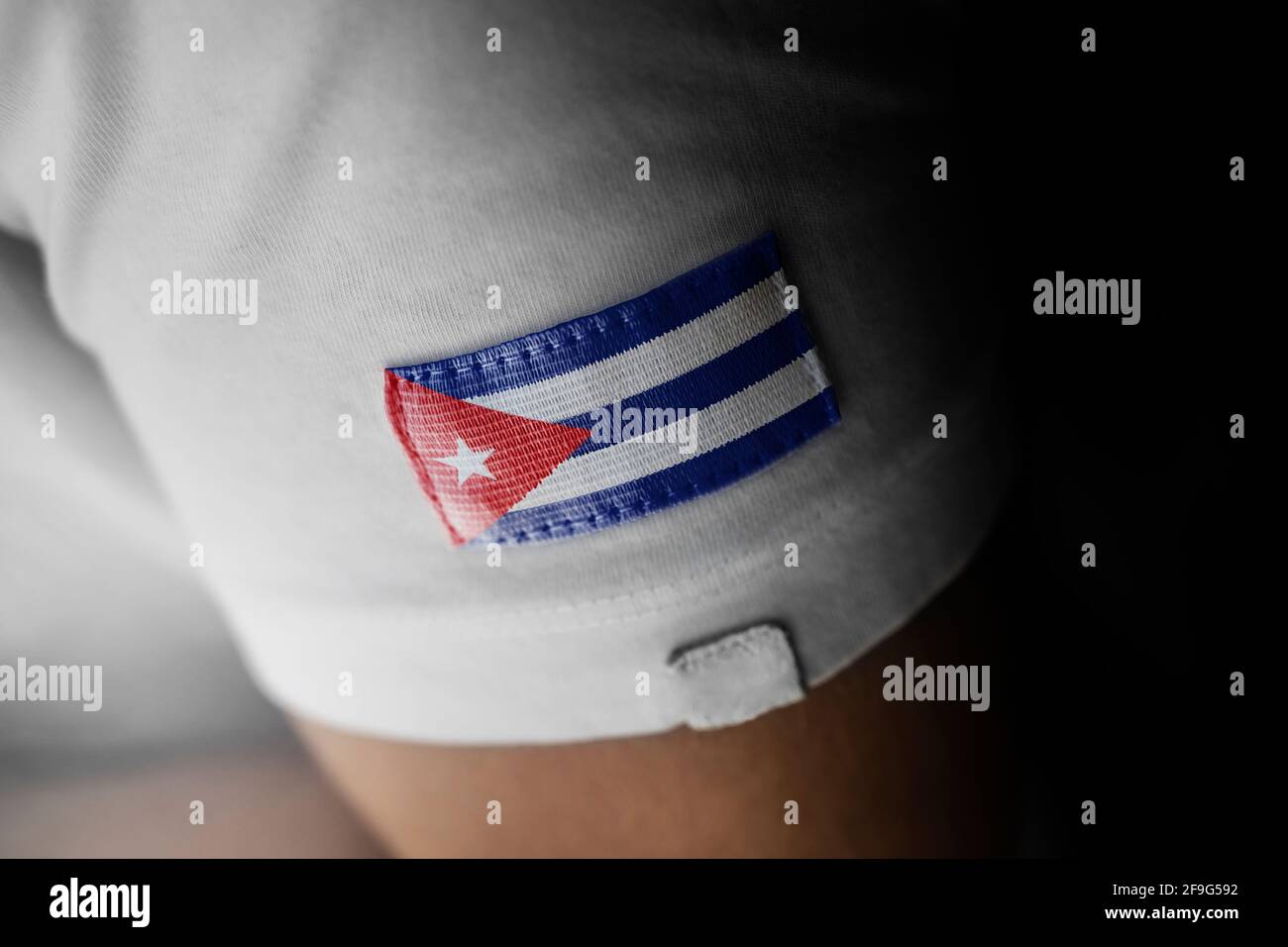 Patch of the national flag of the Cuba on a white t-shirt Stock Photo ...