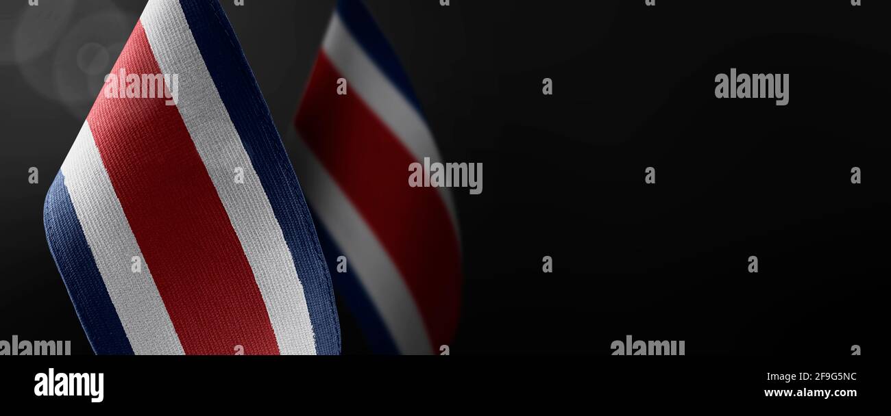 Small national flags of the Costa Rica on a dark background Stock Photo ...