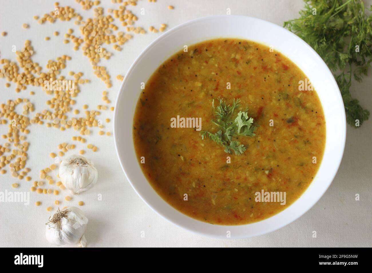 Boiled lentils tempered with garlic and spices. A favourite side dish ...