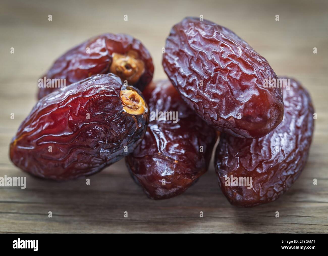 Arabian Dates on natural surface Stock Photo - Alamy