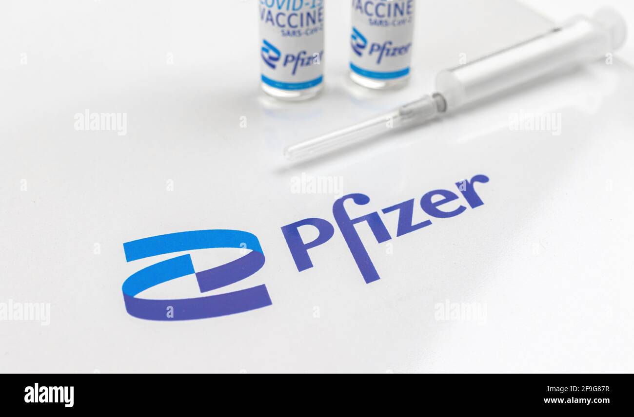 Kharkov, Ukraine - April 18, 2021: Pfizer logo close-up with vaccine ...