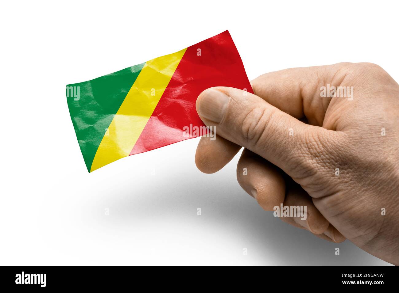 Hand holding a card with a national flag the Congo Stock Photo - Alamy