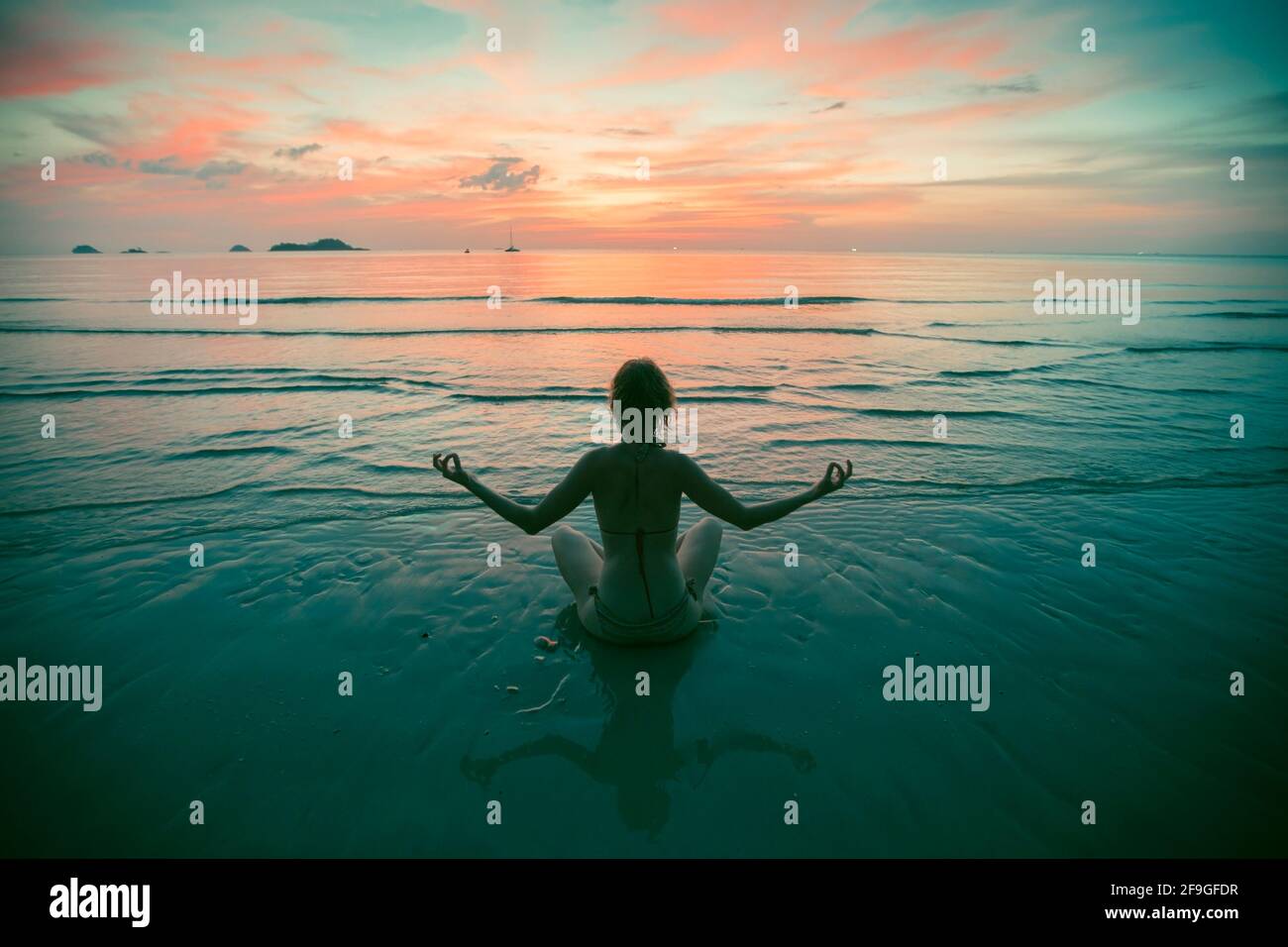 Woman practicing meditation india hi-res stock photography and images ...