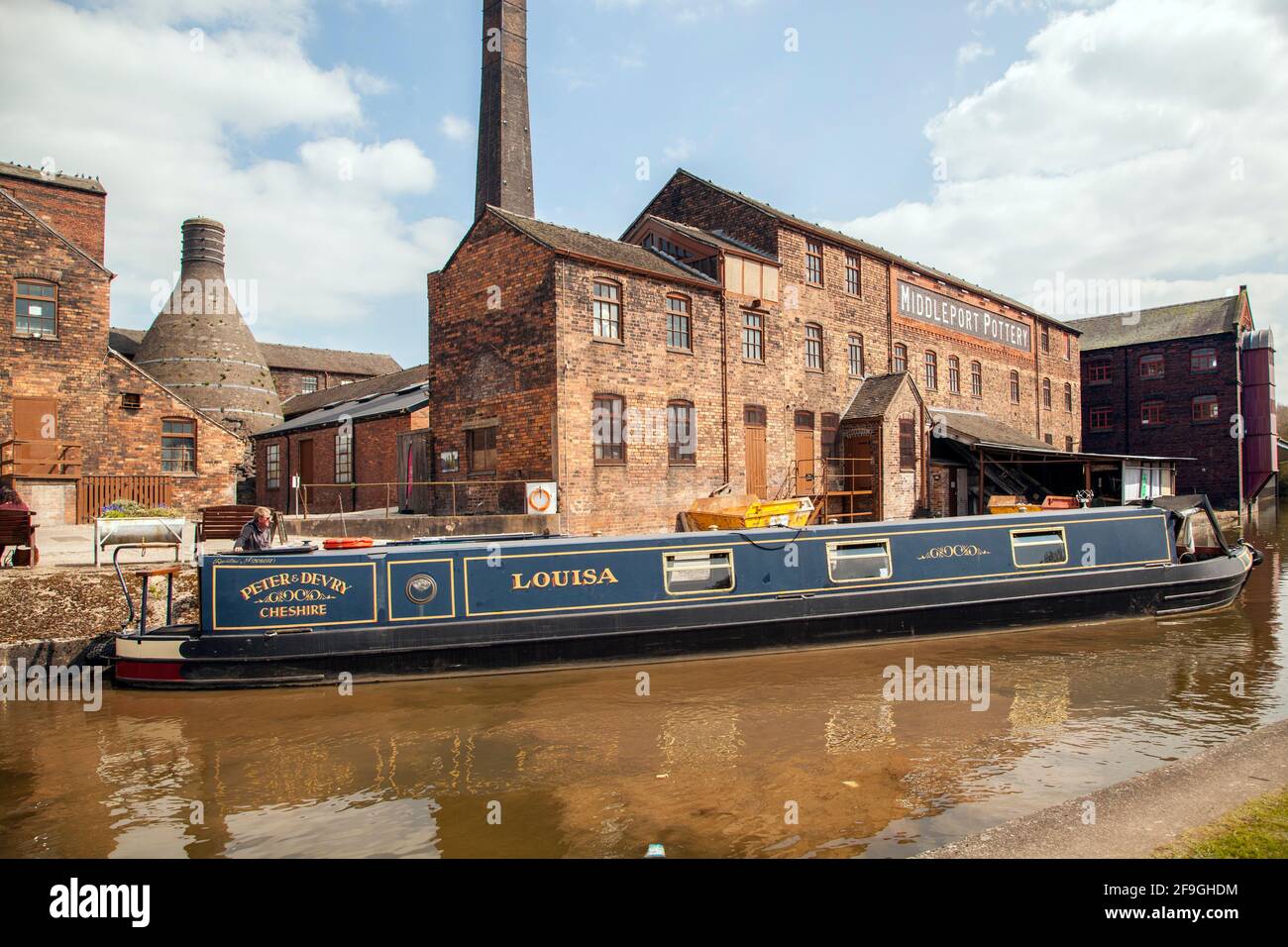 Canal narrowboat alongside the Middleport pottery factory on the Trent ...