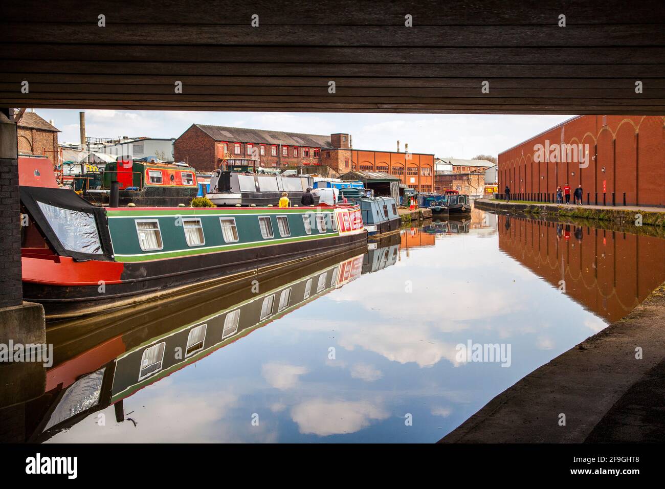 View through canal tunnel at Longport Stoke on Trent of a narrowboat at ...