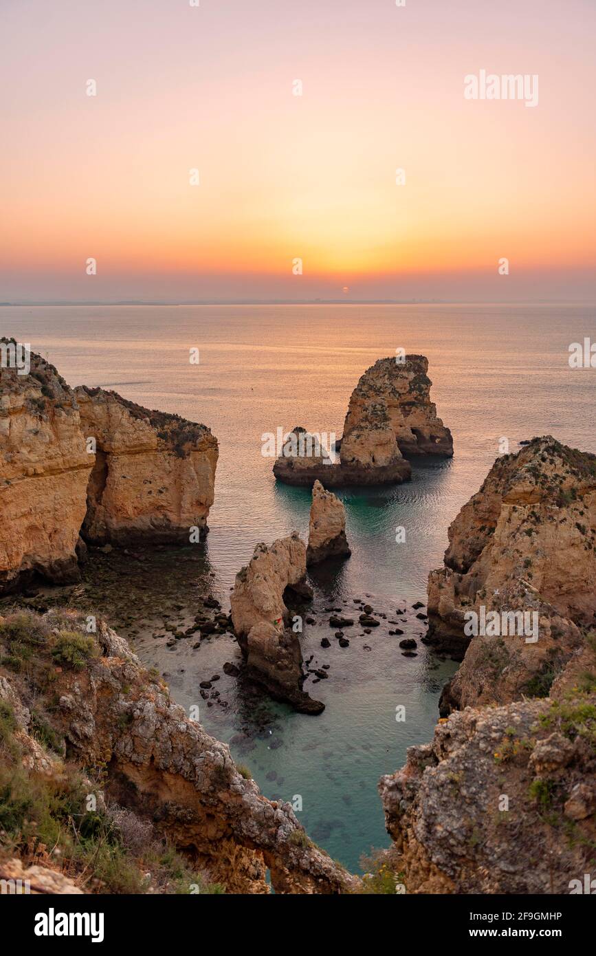 Rugged rocky coast with cliffs of sandstone, rock formations in the sea ...