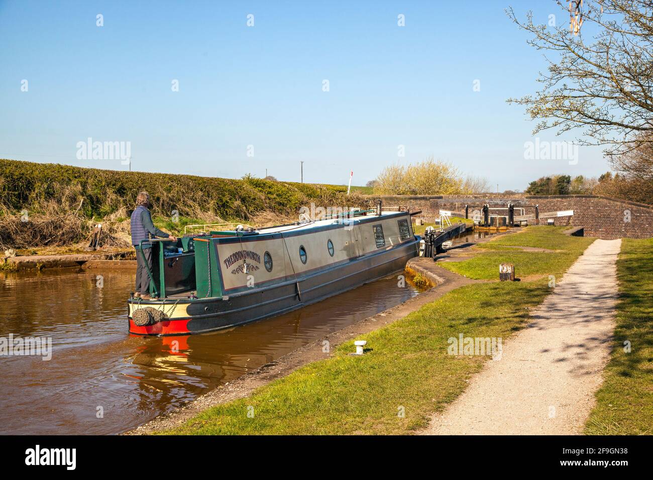 Canal narrowboats on the Trent and Mersey canal near Rode Heath in ...