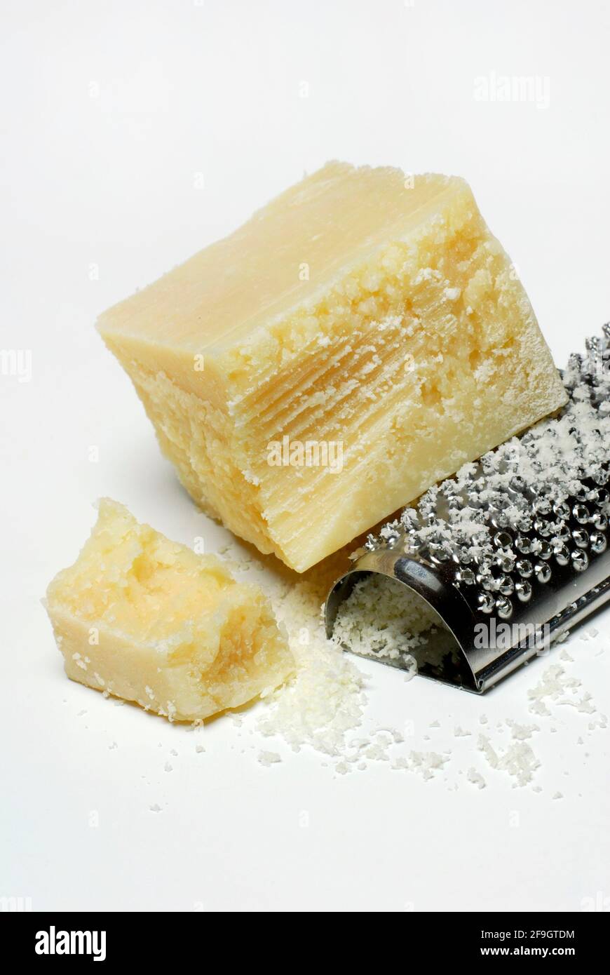 Parmesan cheese, grater, cheese grater Stock Photo - Alamy