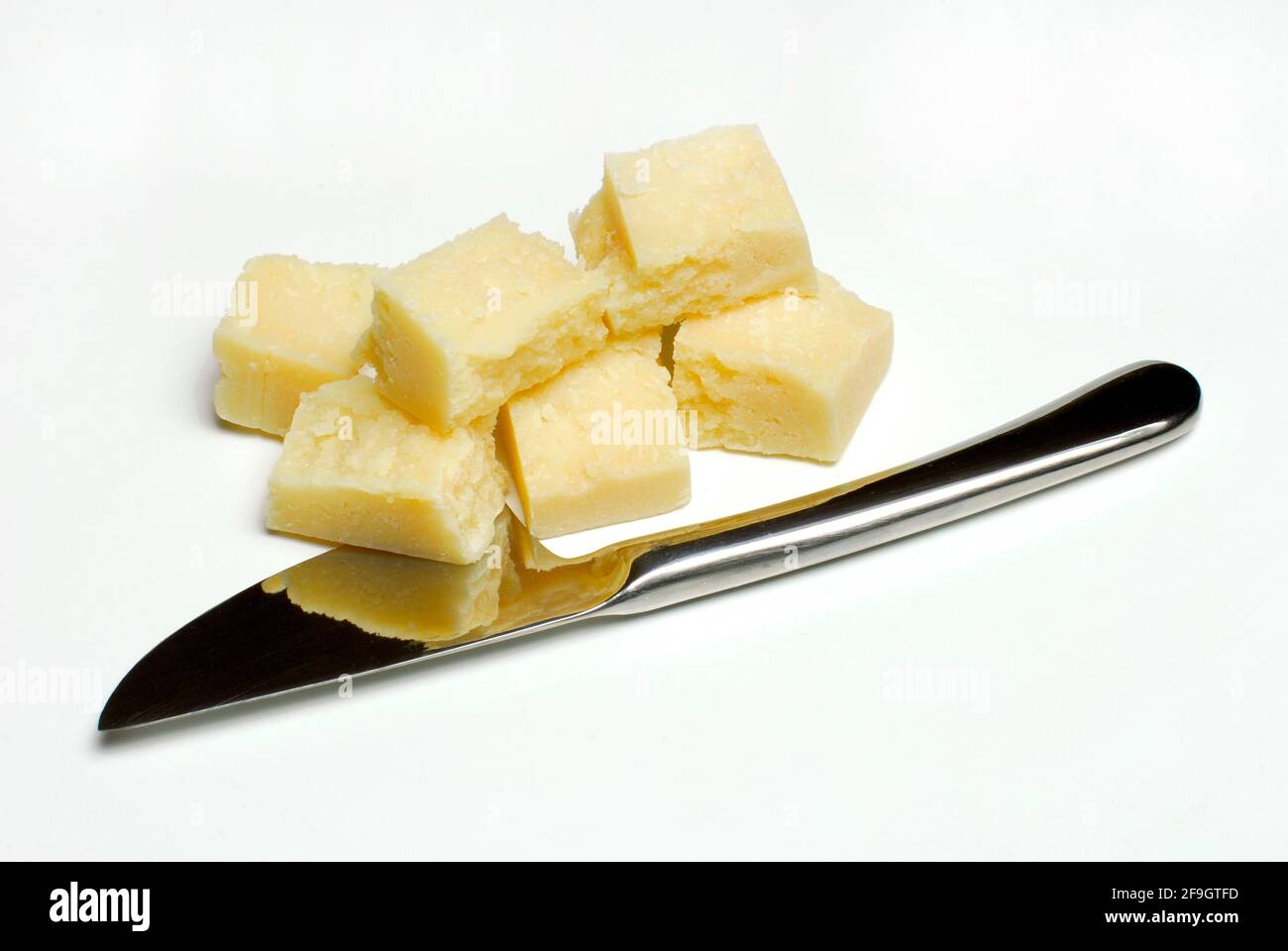 Parmesan cheese, cheese knife, knife Stock Photo - Alamy