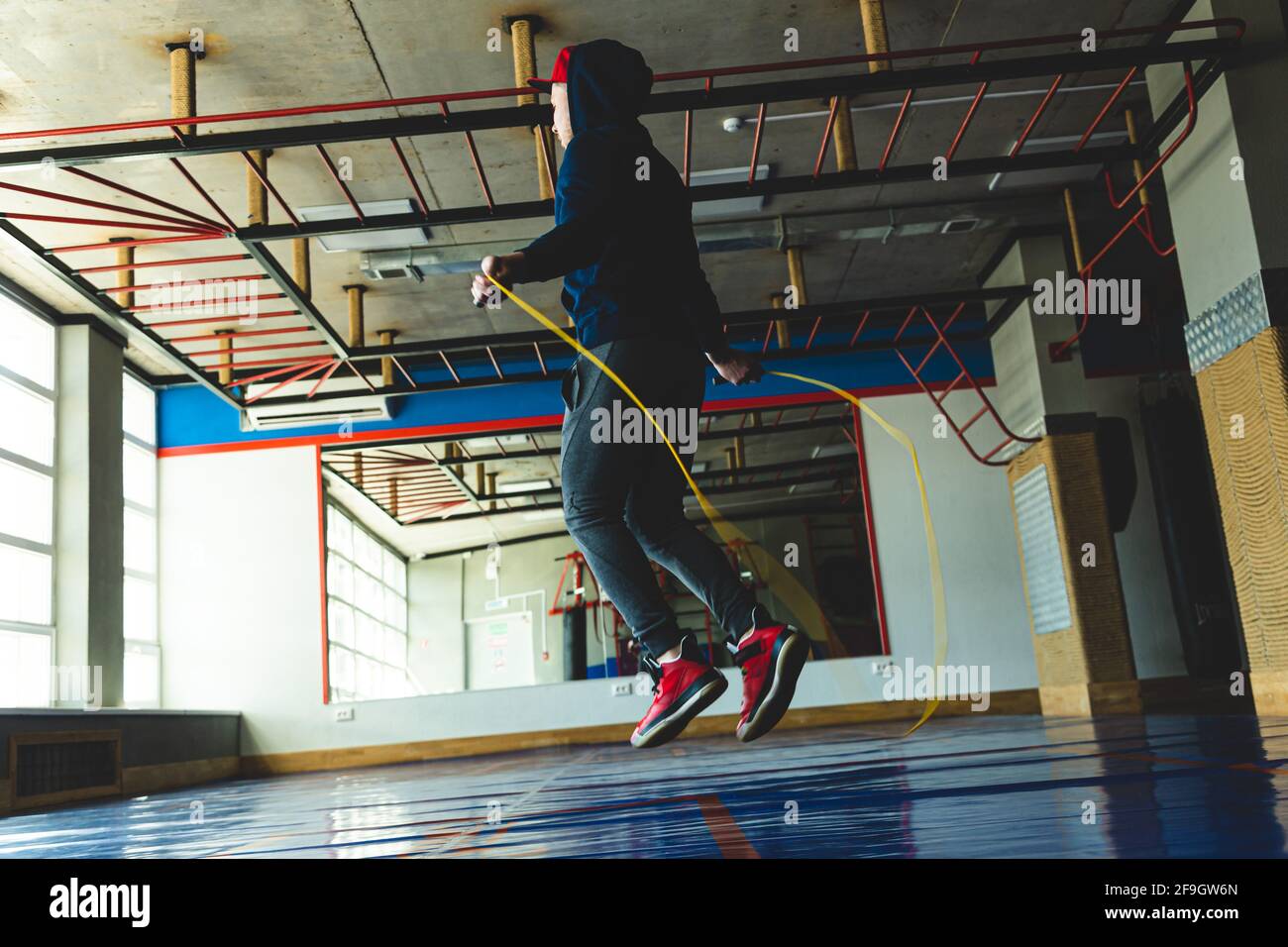 Muscular athlete in dark room hi-res stock photography and images - Alamy