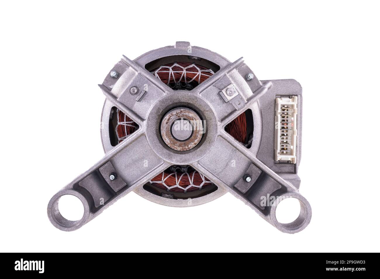 The electric motor from the washing machine. Spare parts used to repair ...