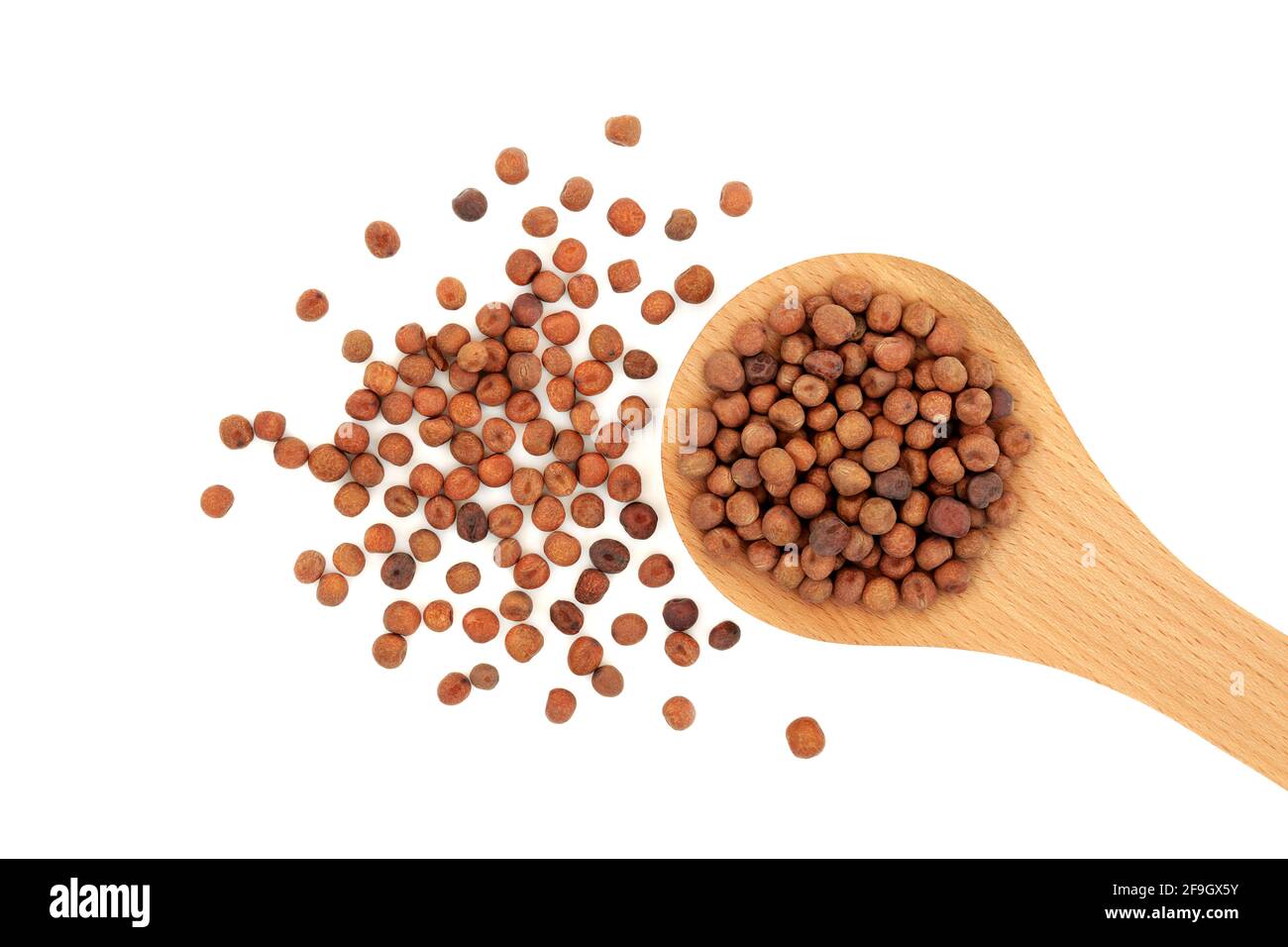 Carlin peas health food in a wooden spoon & loose on white background ...