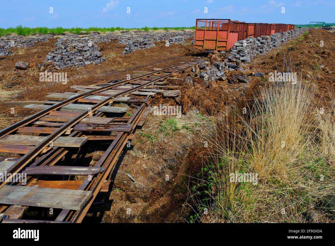Industrial peat cutting, peat-laden light railway, Goldenstedter Moor ...