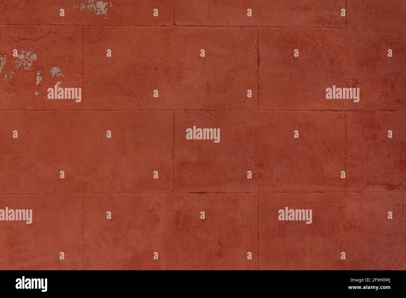 A view of the red laminate classen textured wall Stock Photo - Alamy