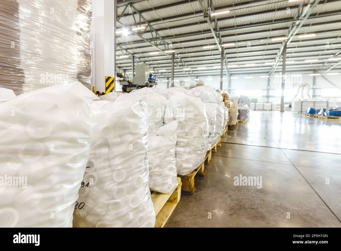 Spacious light interior of a large warehouse in a factory with special ...