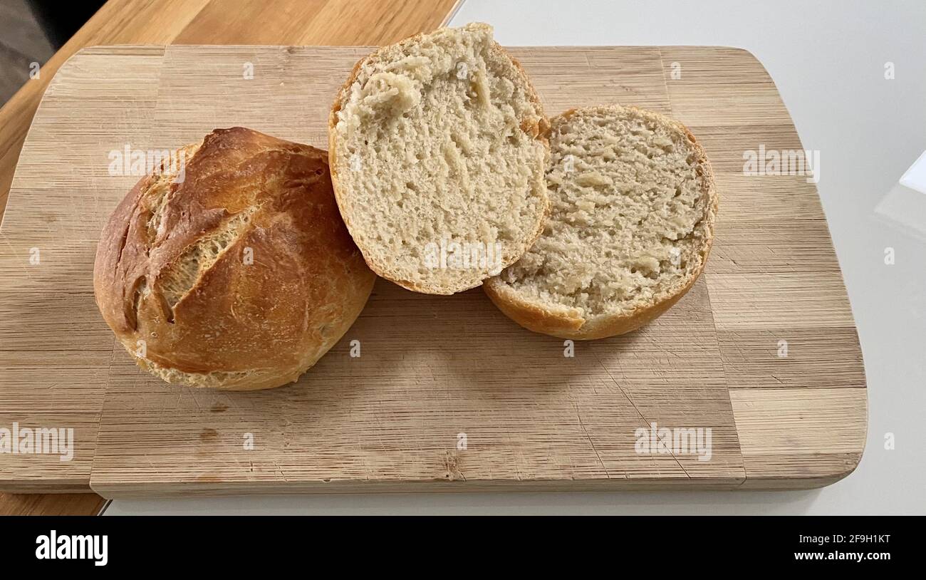 The top view of slices of bread placed on the wooden board Stock Photo ...