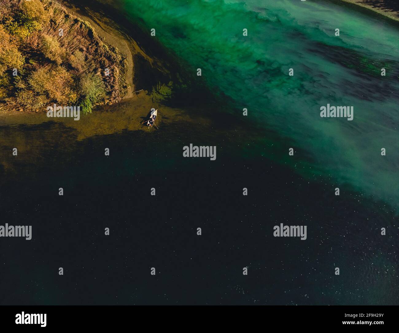 Aerial view fishing boat floating blue sea water hi-res stock ...