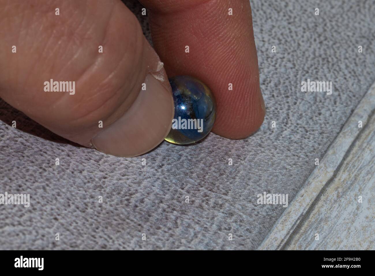 Children playing marbles hi-res stock photography and images - Alamy