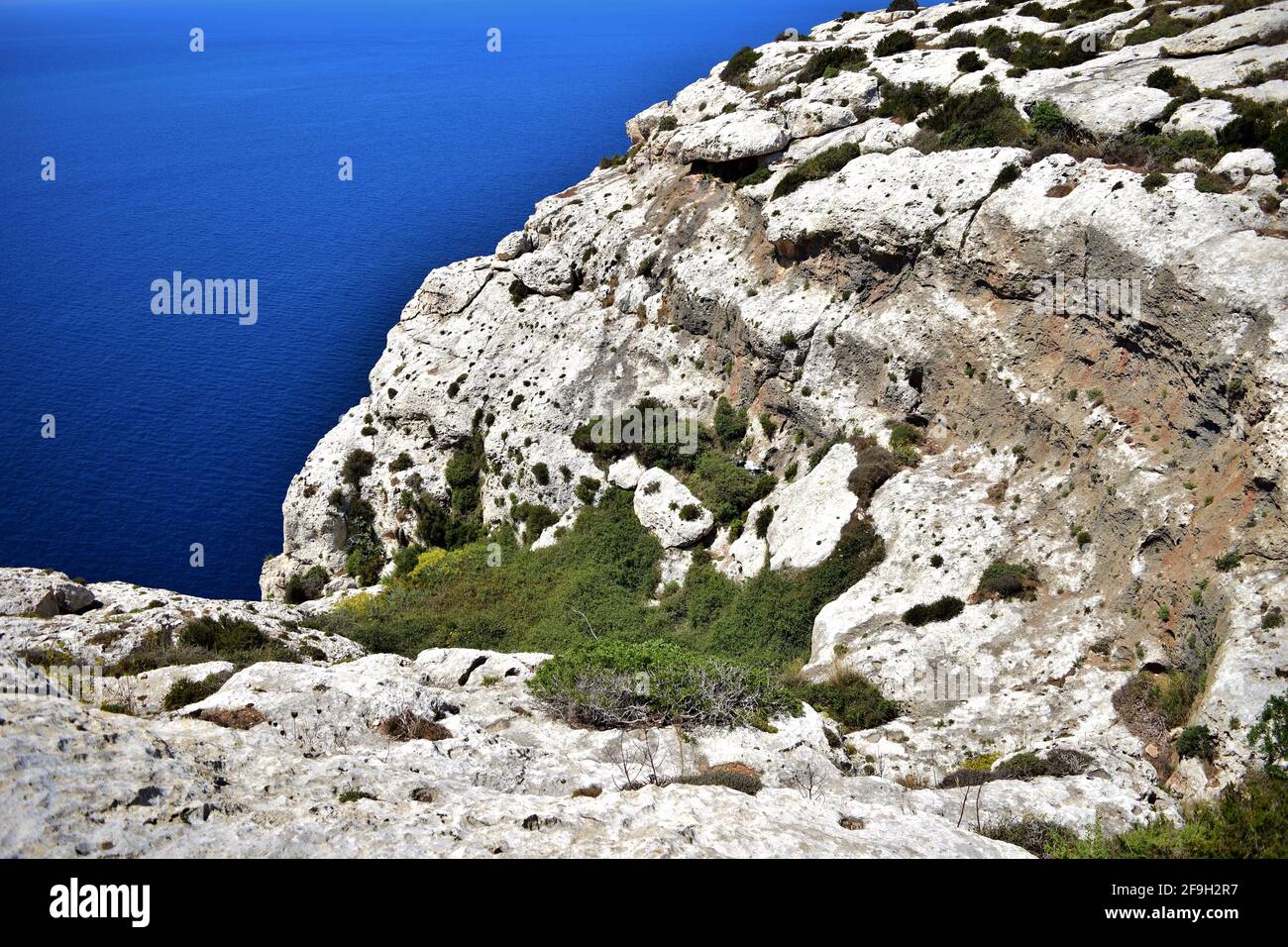 The V-shaped valley along the coastal cliffs of the Maltese Islands ...