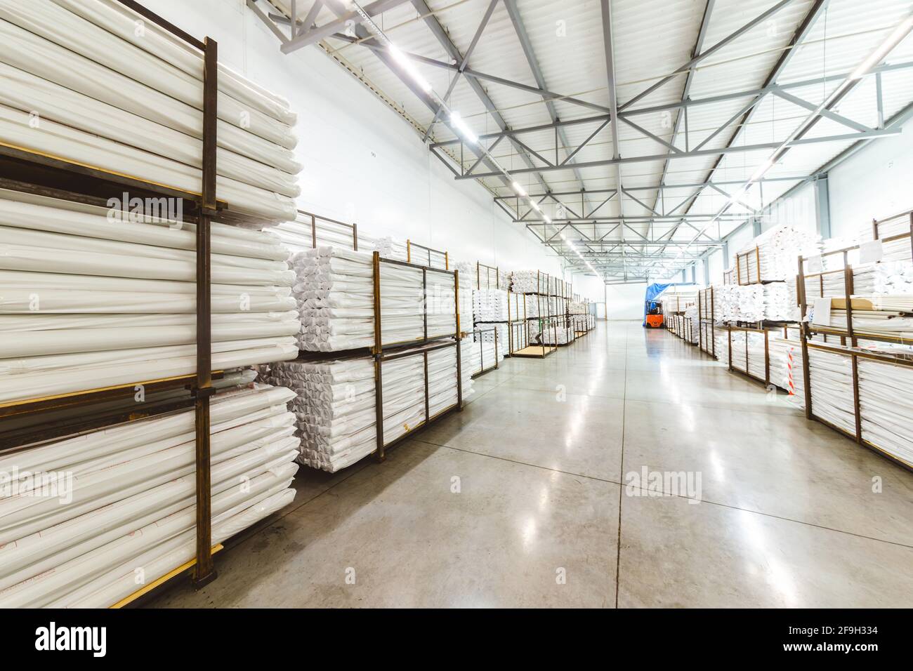 Spacious light interior of a large warehouse in a factory with special ...