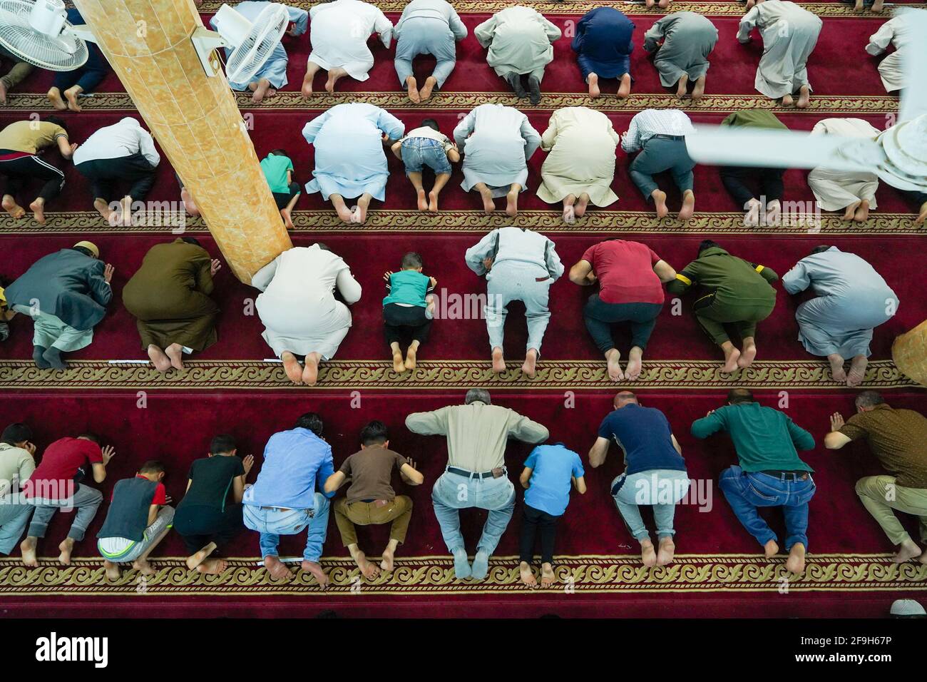 Muslims perform Tarawih prayers at the Sheikh Muhammad Al-Melhem Mosque ...