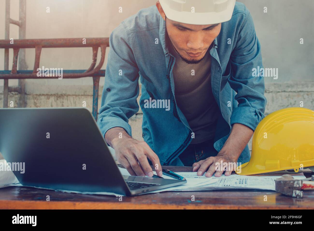 Engineer inspection building construction project on paperwork and use ...