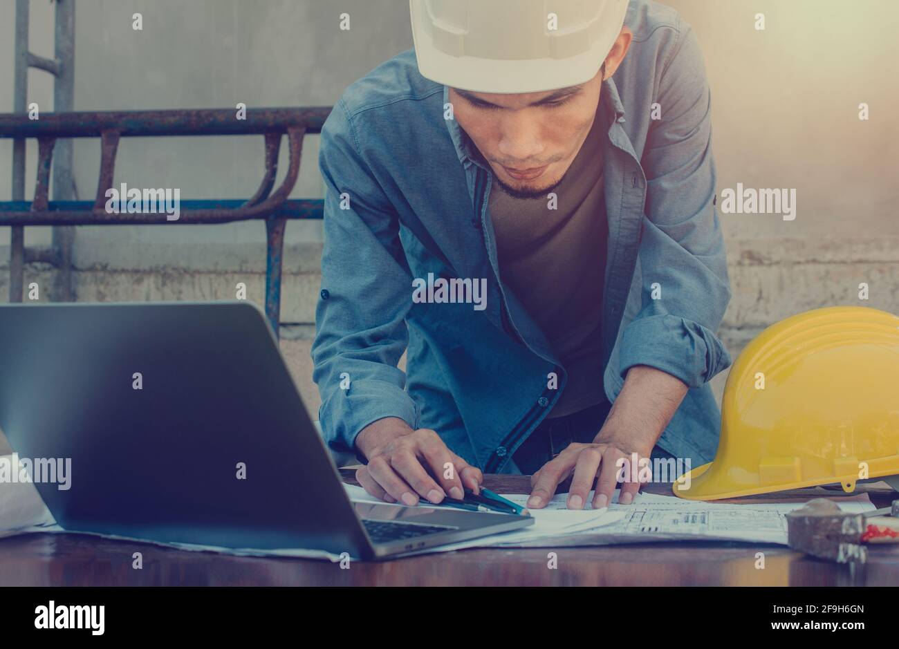 Engineer checking design building construction by computer technology ...