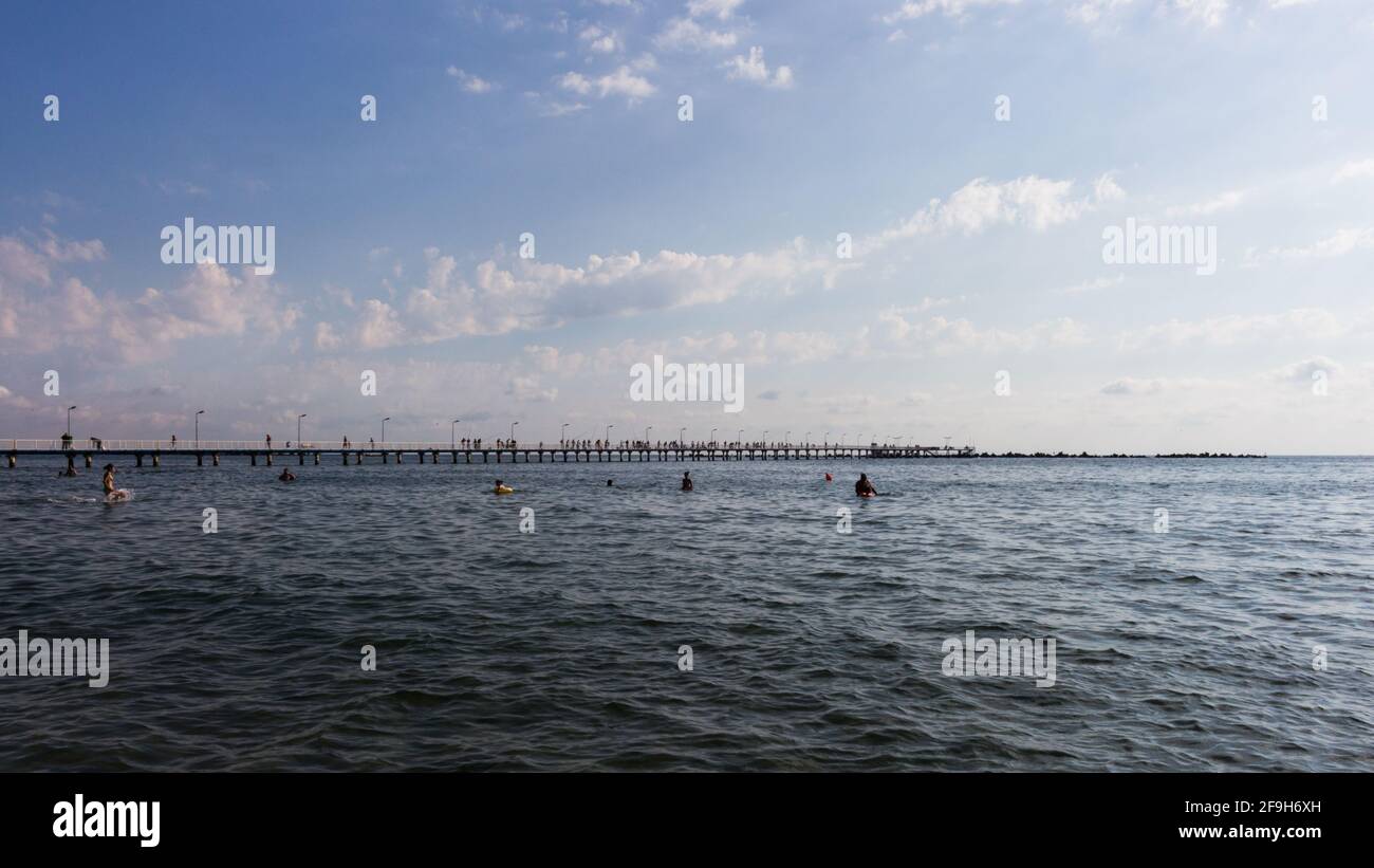 Beautiful seascape with a pier aligning the horizon at the Mariner ...