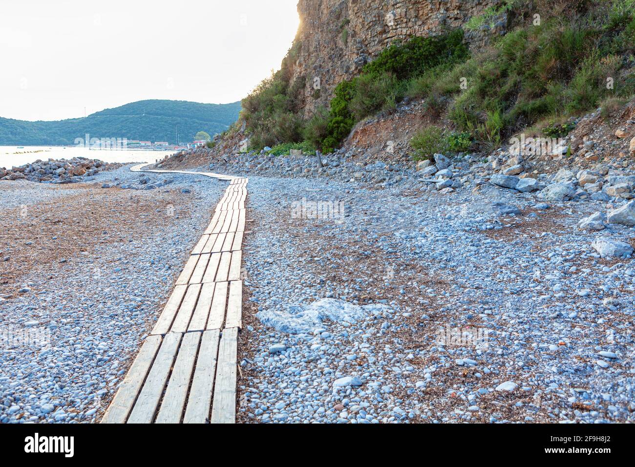 Wooden planks path for walking along the beach Stock Photo - Alamy