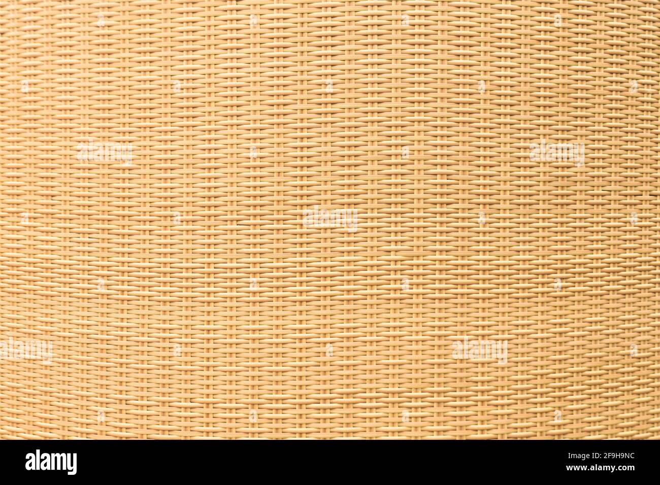Yellow rattan wood texture and background Stock Photo - Alamy