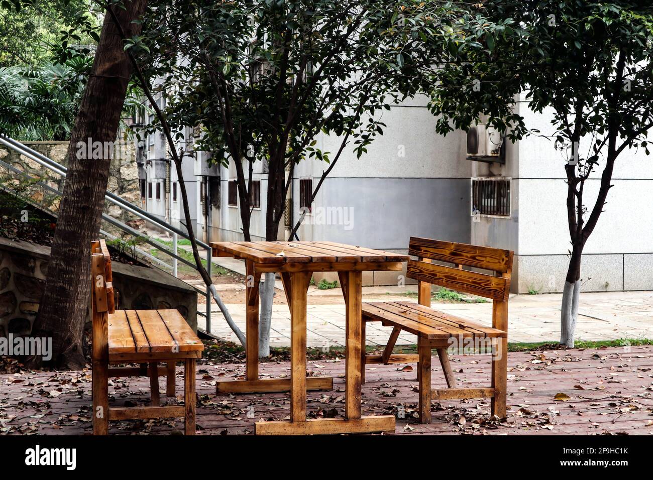 A chair for visitors to rest in a park Stock Photo - Alamy