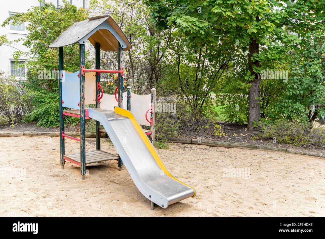 Modern colorful playground with slides, swings and other children's ...