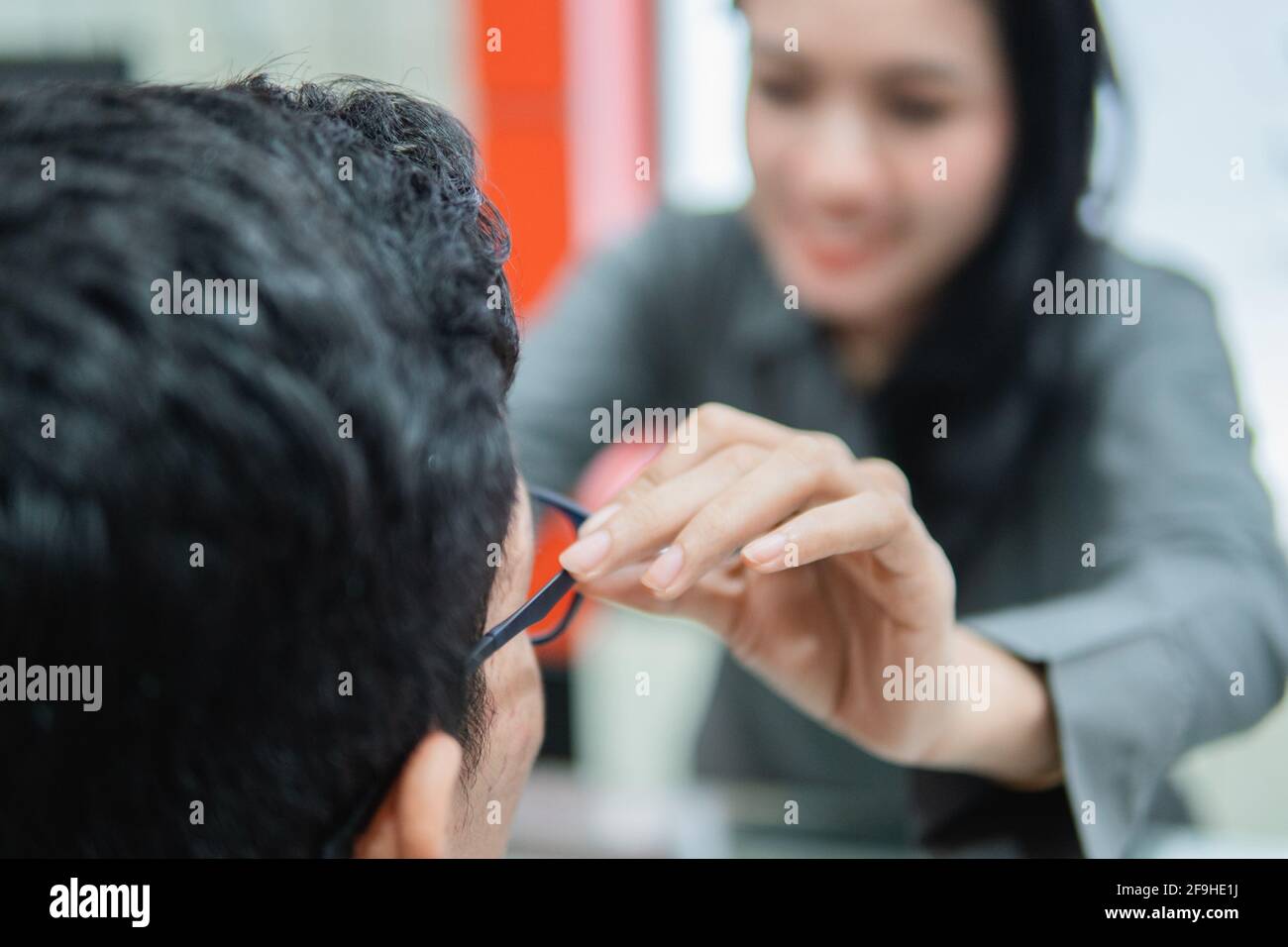 Put on glasses hi-res stock photography and images - Alamy