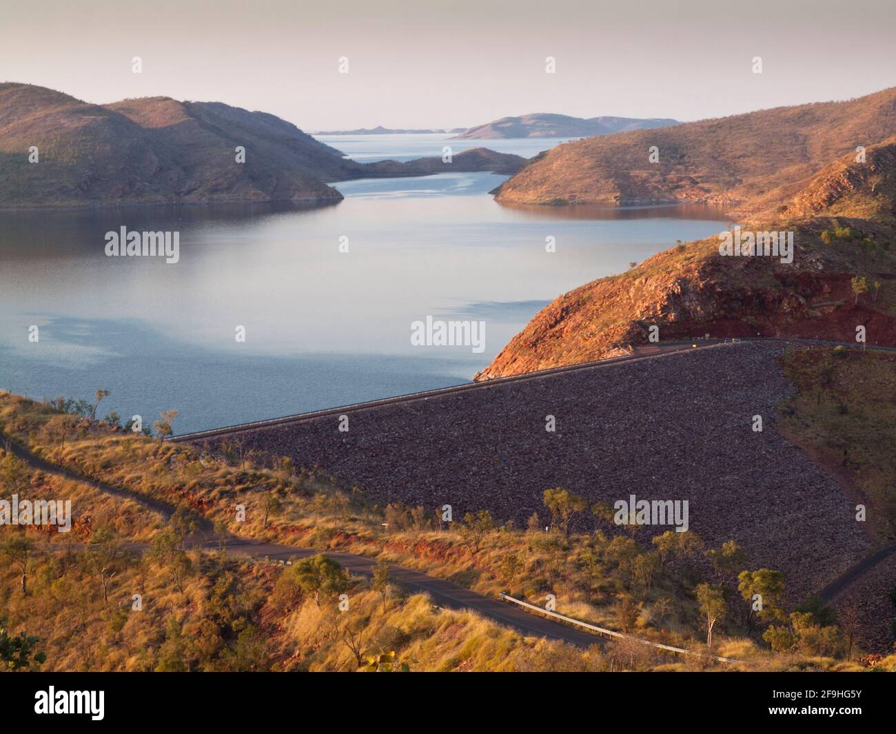 Pre-dawn glow on the hills above Lake Argyle and the earthen Old River ...