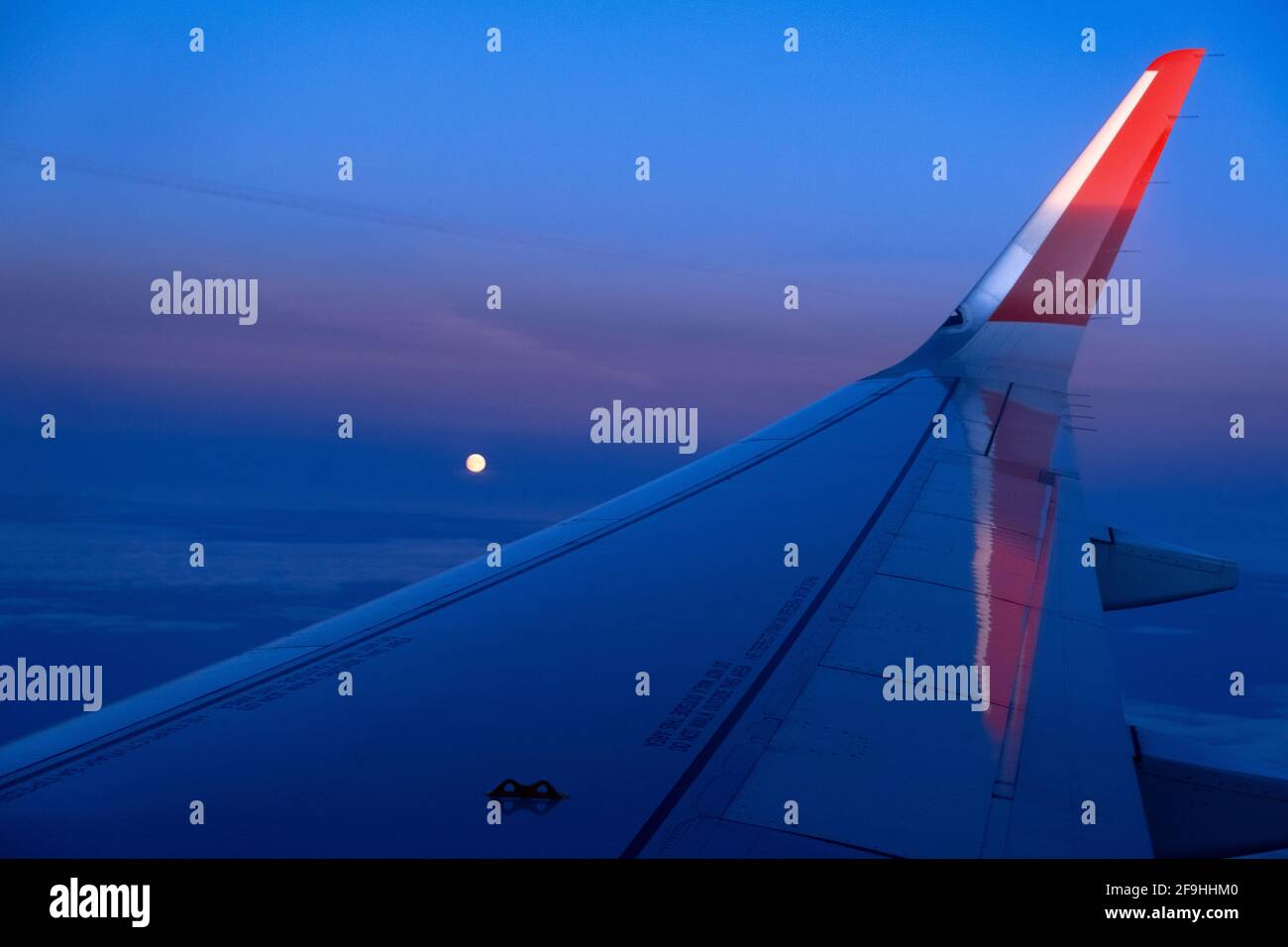 airplane window picture with sun on the horizon Stock Photo - Alamy