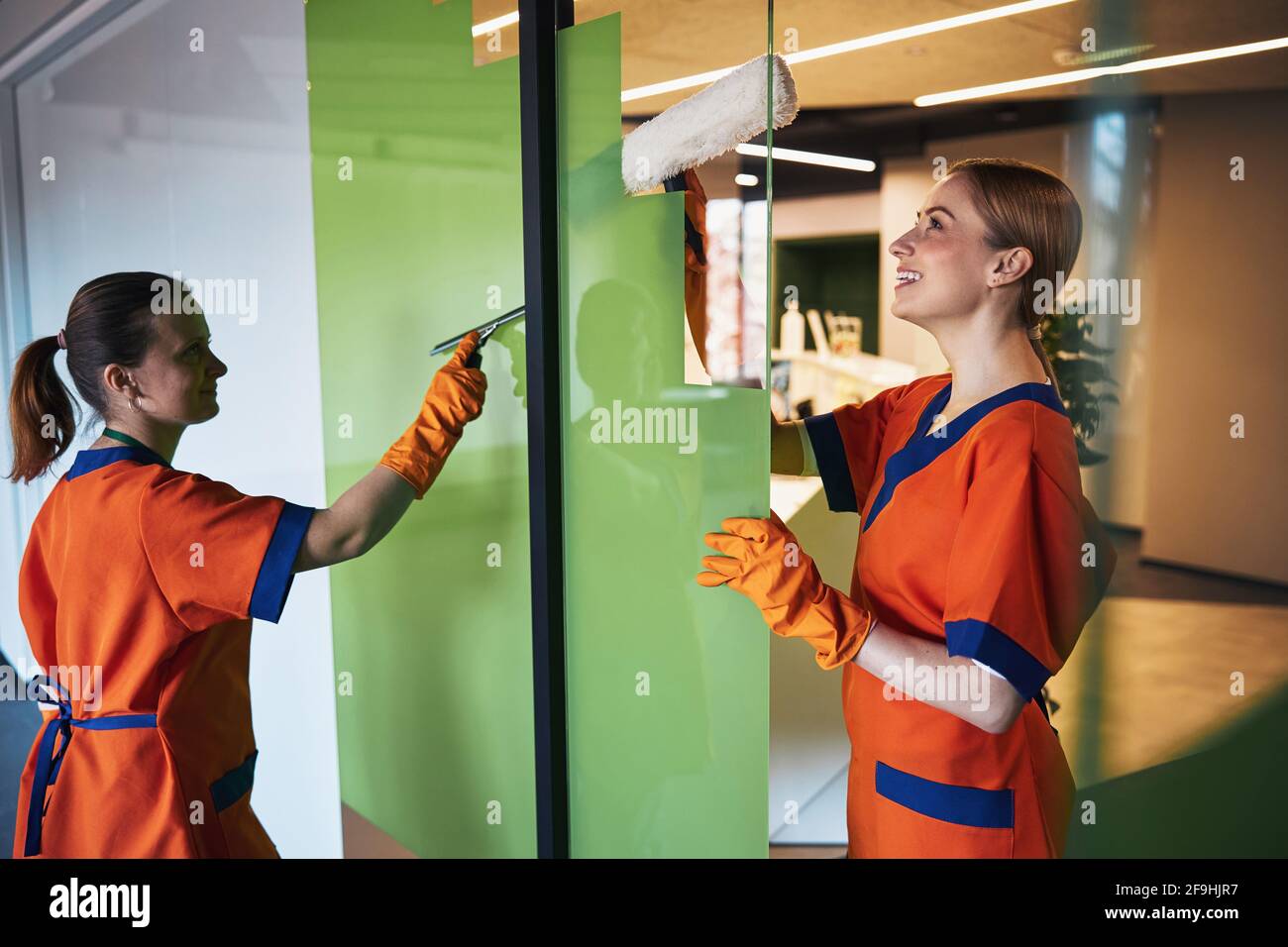 Two women doing washing hi-res stock photography and images - Alamy