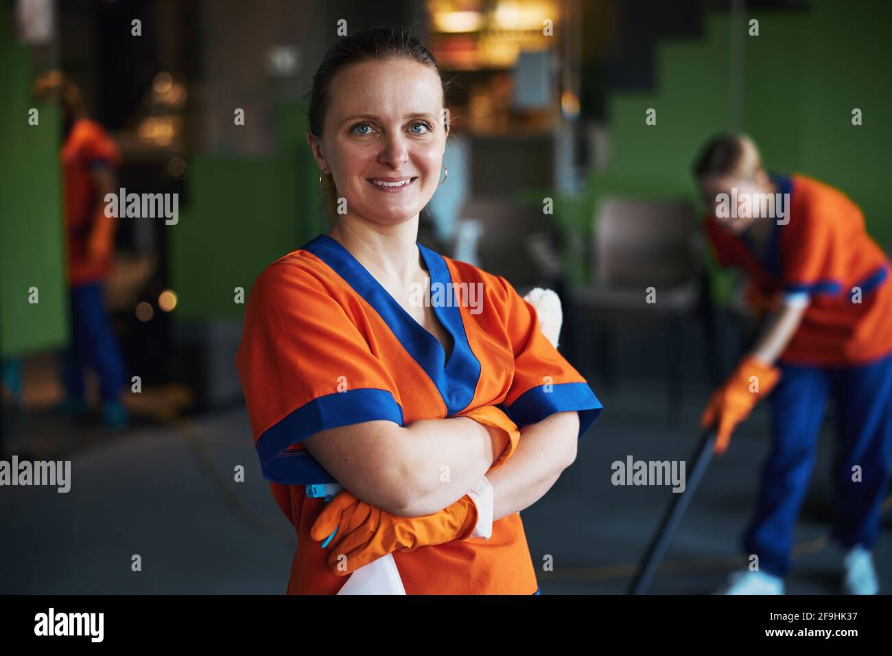 Portrait female janitor cleaning hi-res stock photography and images ...