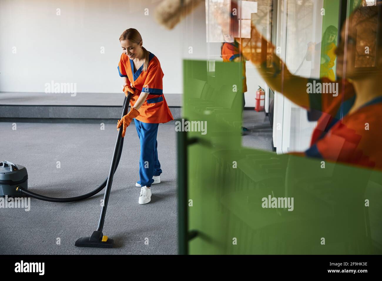 Lady janitor hi-res stock photography and images - Alamy