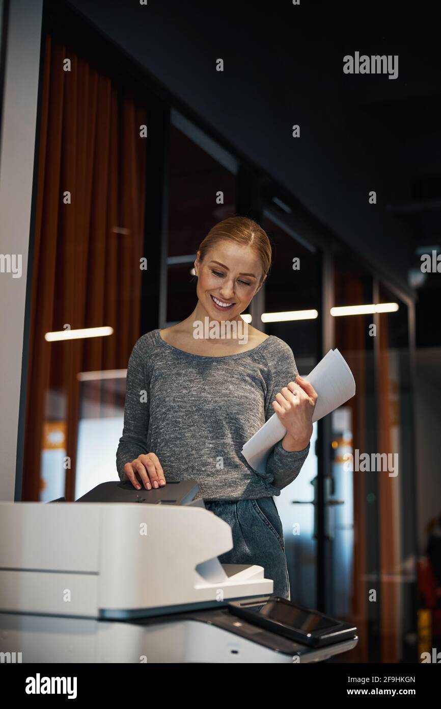 Cute blonde secretary hi-res stock photography and images - Alamy