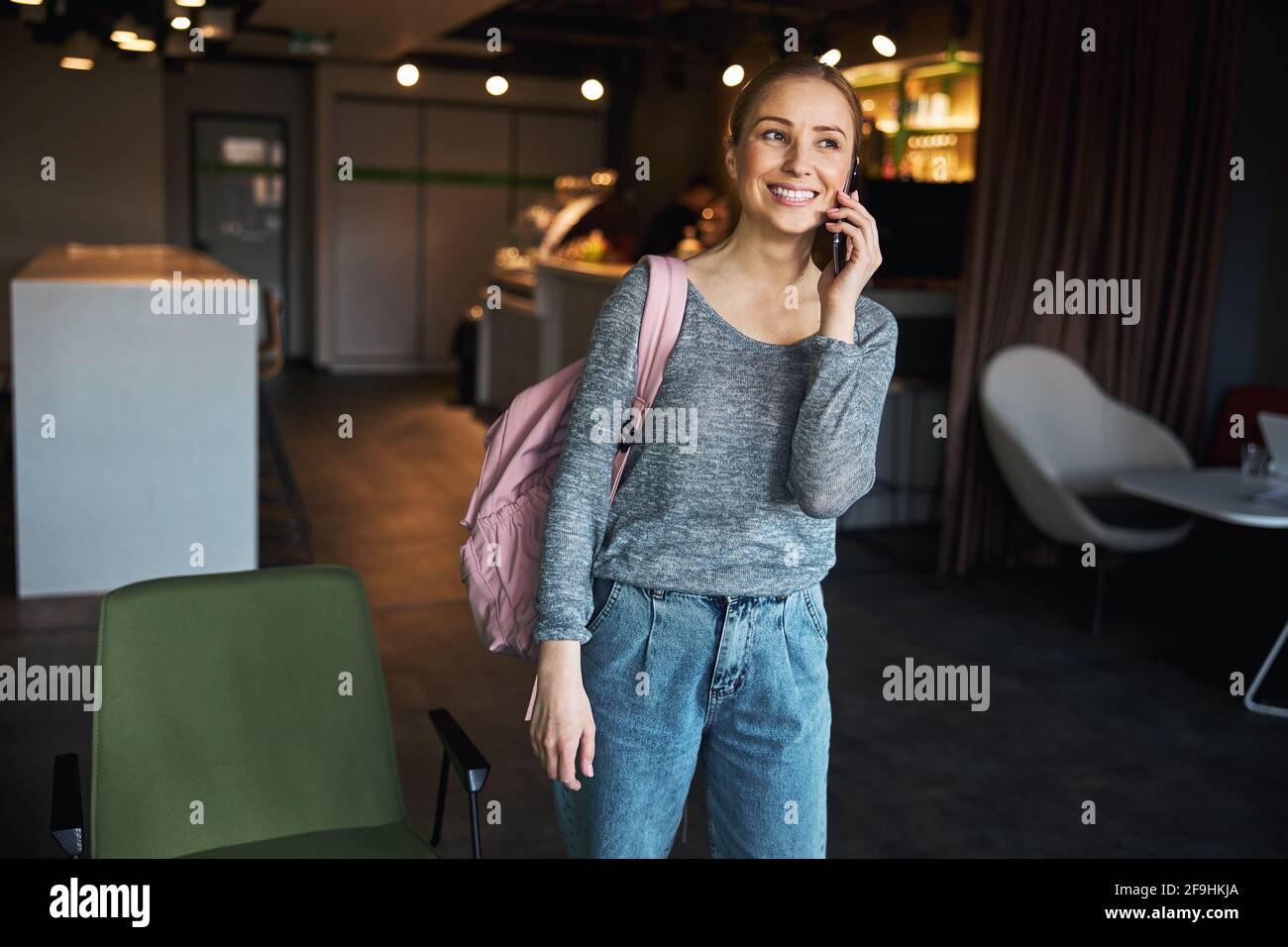 Joyous beautiful woman making a phone call Stock Photo - Alamy