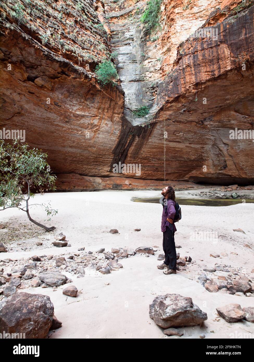 Tourist in Cathedral Gorge, Purnululu National Park, Western Australia ...