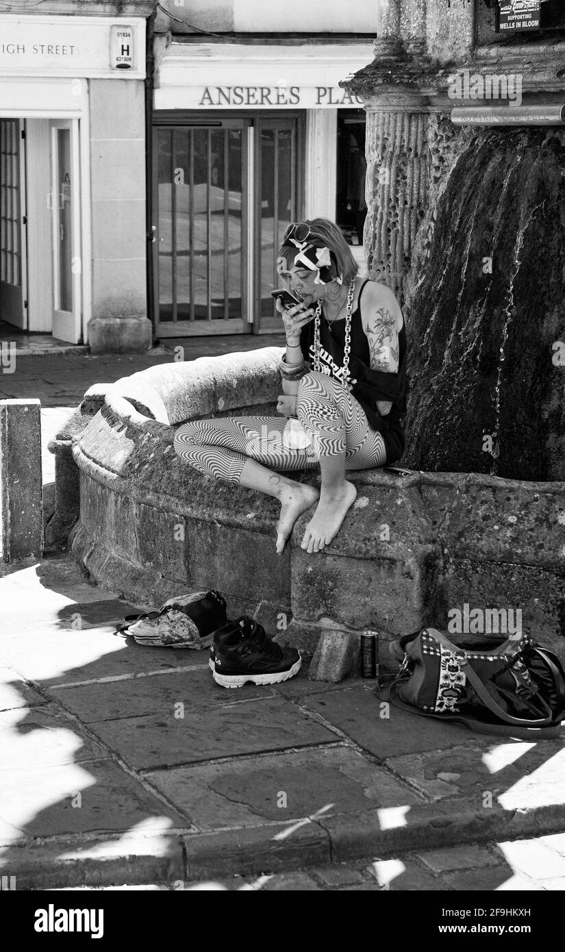 Street life of every day People around Town carrying out normal lives ...