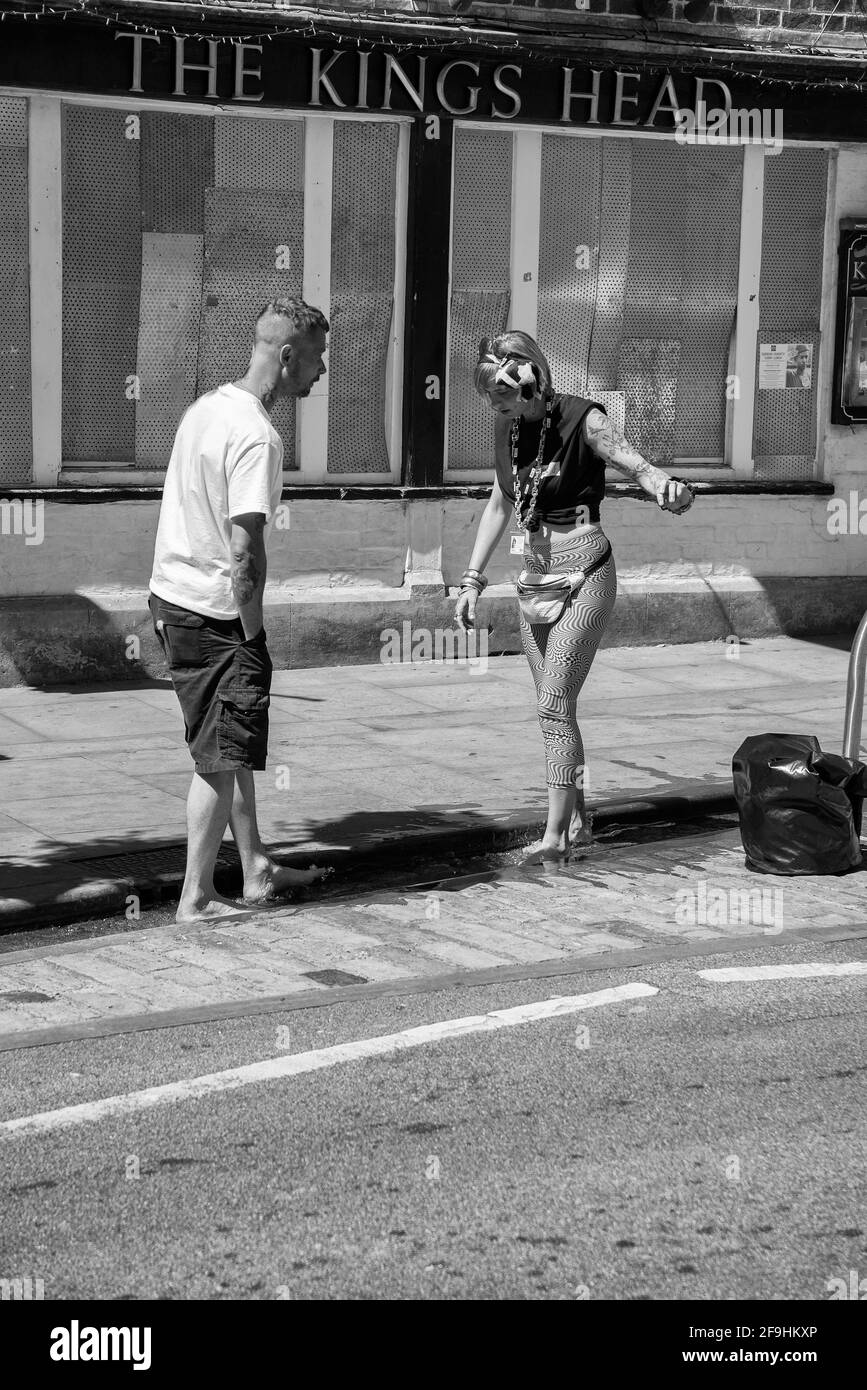 Street life of every day People around Town carrying out normal lives ...